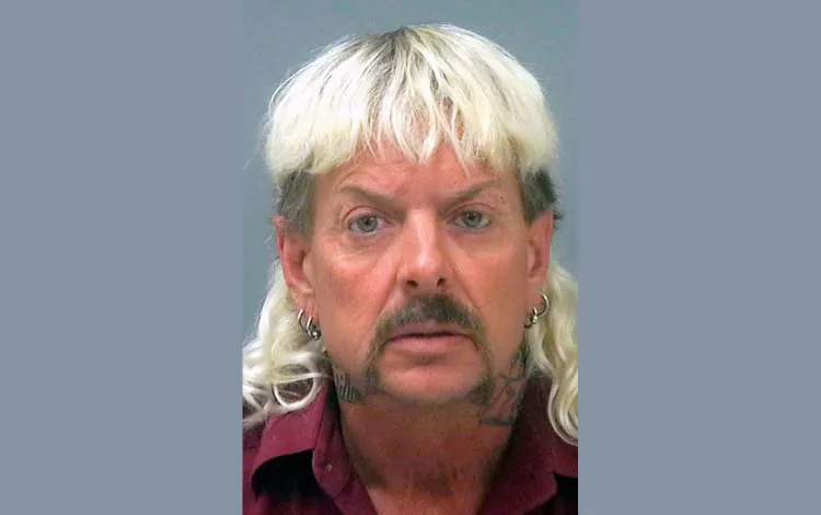 ‘Joe Exotic’ Sentenced to 22 Years for Shooting Five Tigers, Plotting ...
