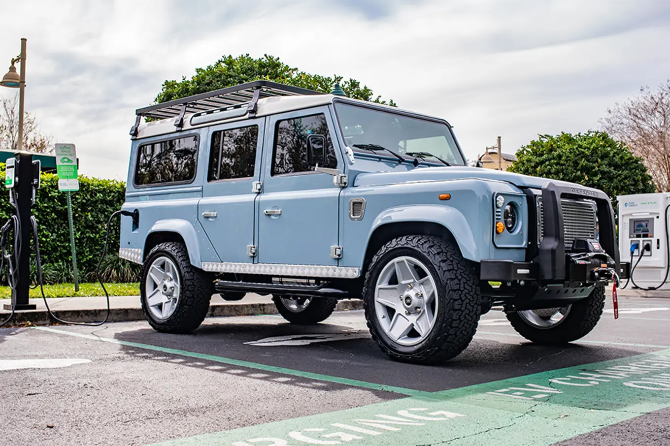 Tesla-powered Vintage Land Rover Defender 110s Hit the Road - Newsweek