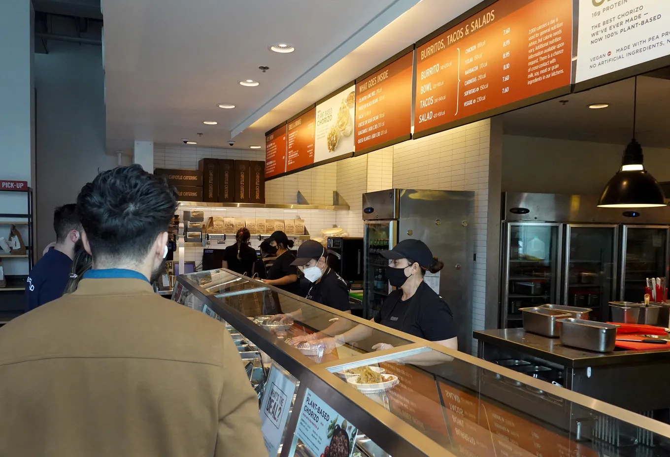 Chipotle Customer Hops Counter to Work Register After Food Takes Too ...