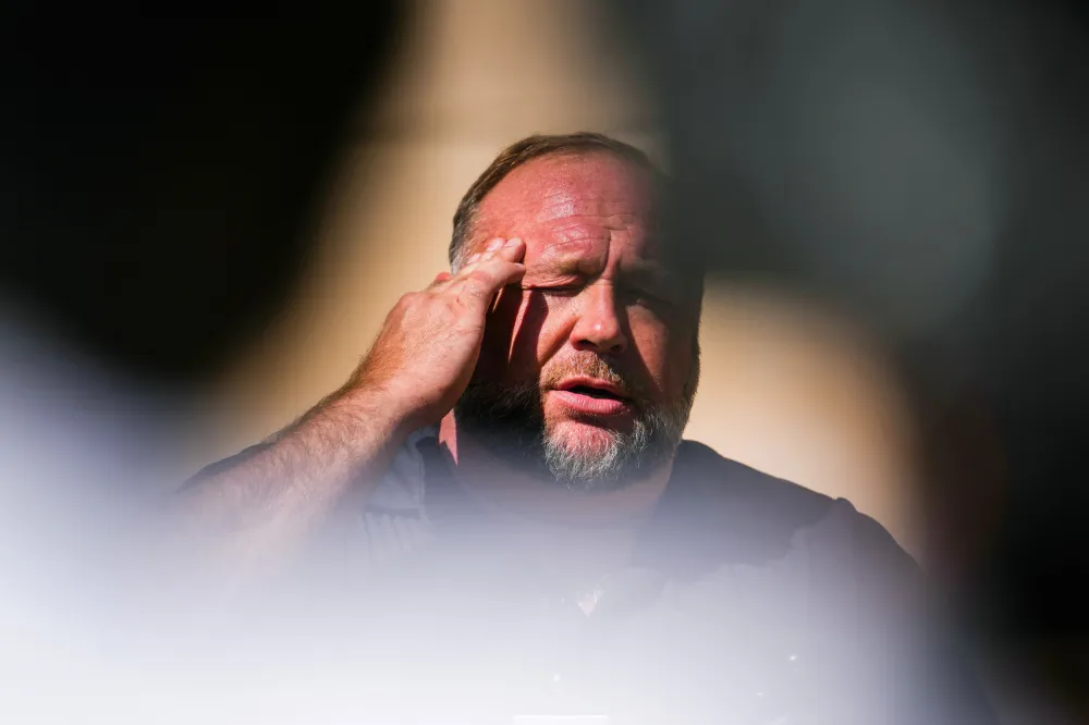Alex Jones Ordered to Pay Nearly $1B to Sandy Hook Families - Newsweek