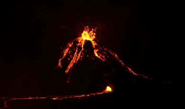 Mesmerizing Video Captures Waterfall of Lava Spewing From Volcano ...