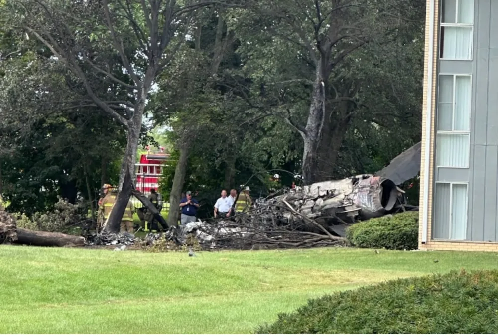 Videos Show Fighter Jet Crash into Parking Lot During Michigan Air Show ...