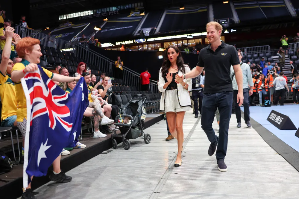 Prince Harry and Meghan Markle Begin Invictus Games With Sweet PDA ...