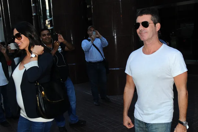 Inside Simon Cowell’s Life With Fiancée Lauren Silverman and Son Eric ...