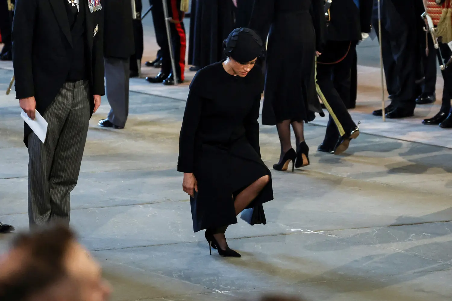 Meghan Markle’s Royal Wedding Curtsy Questioned in Viral Video - Newsweek