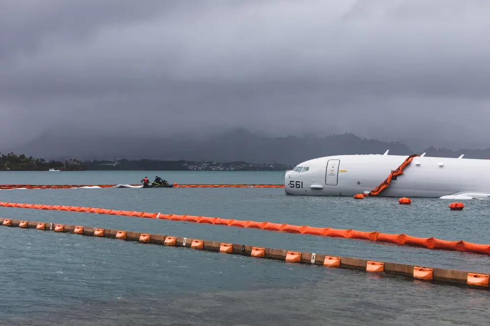 US Military Photos Reveal Navy’s Crashed Plane off Hawaii - Newsweek
