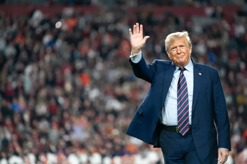 Donald Trump Greeted by Loud Boos at South Carolina Football Game ...