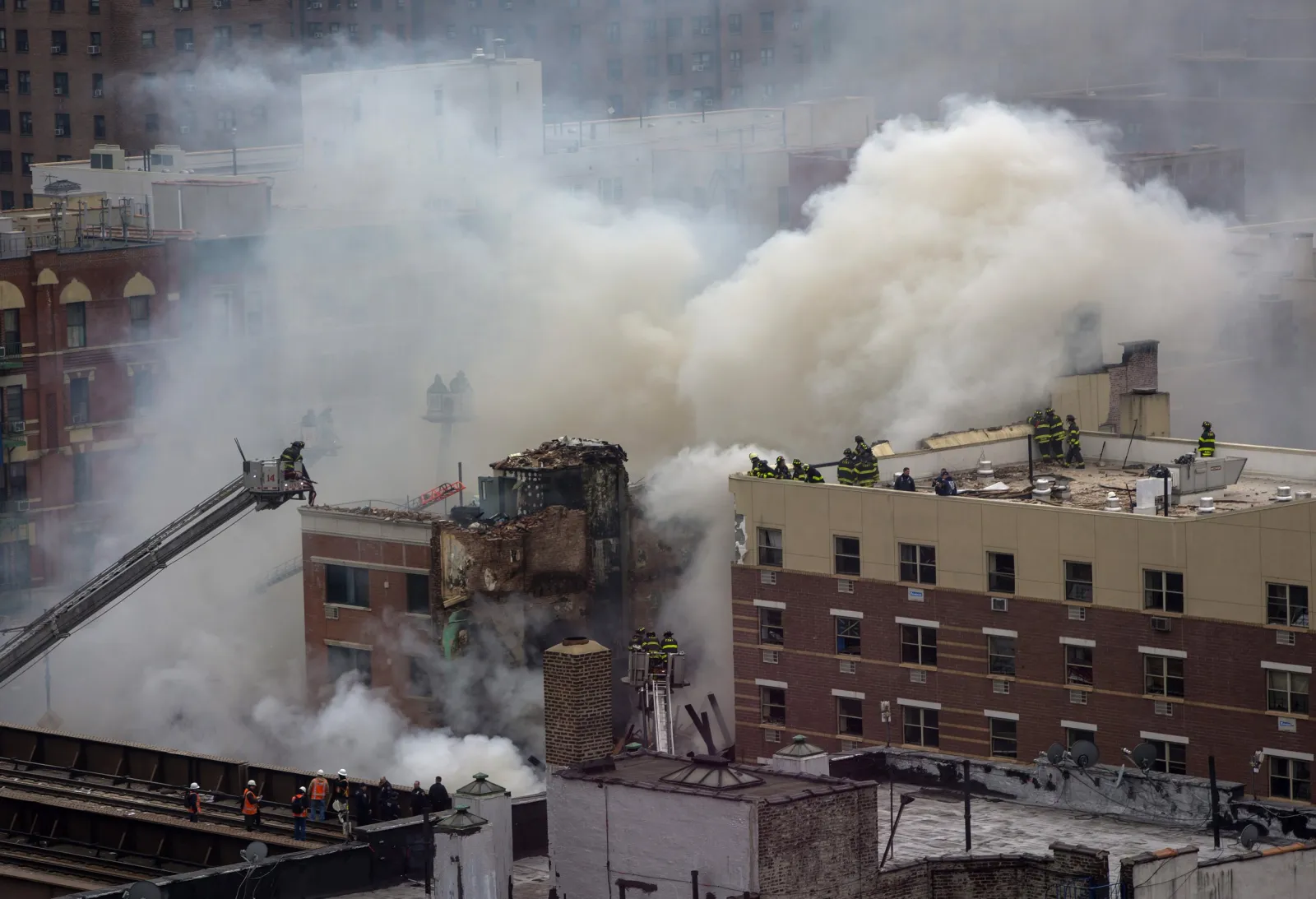 At Least Three Killed in Fiery Collapse of Two Harlem Buildings - Newsweek