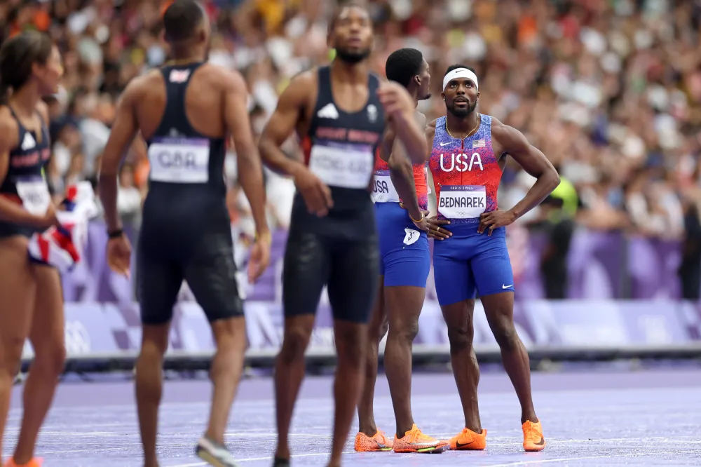 U.S. Men's Olympic Relay Team Disqualified After Disastrous Handoff ...