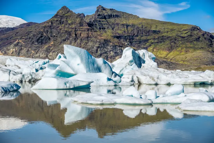 Viral Clip Shows Moment Iceberg Flips Over in Rare Phenom... - Newsweek