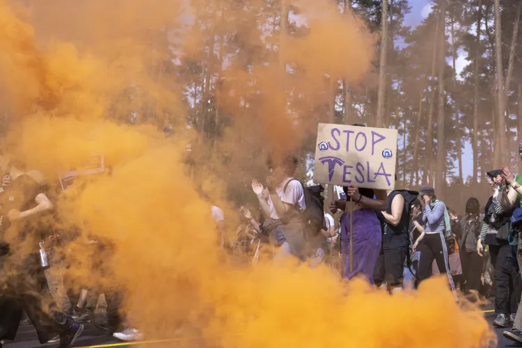 Florida Man Drives Car Into Tesla Protesters - Newsweek