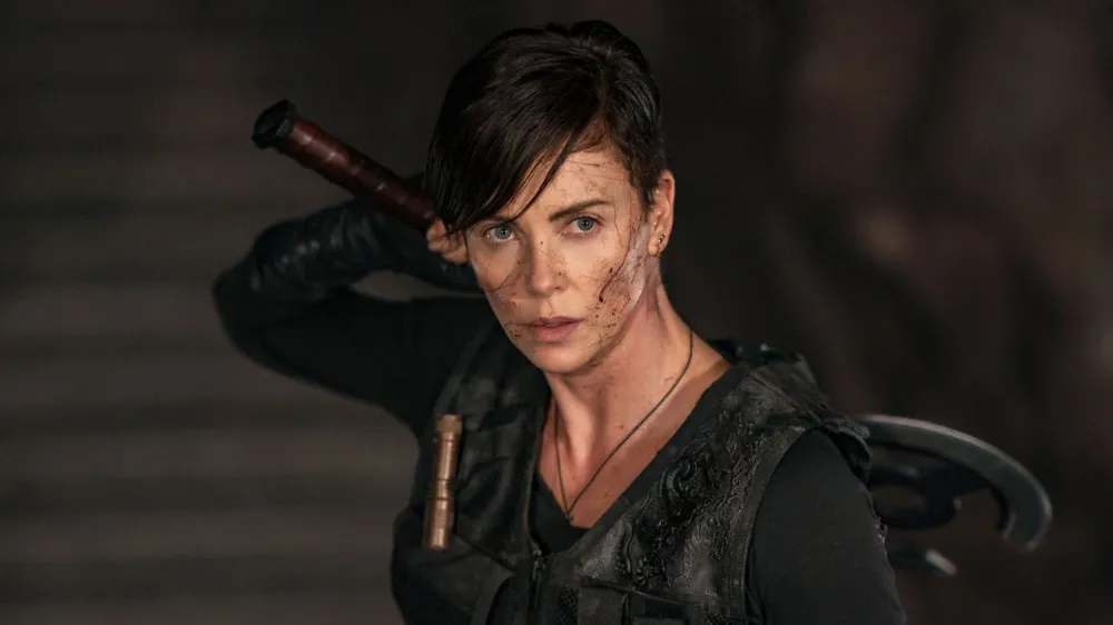 'The Old Guard 2' Reveals Bloodied Charlize Theron in First Look Photos ...