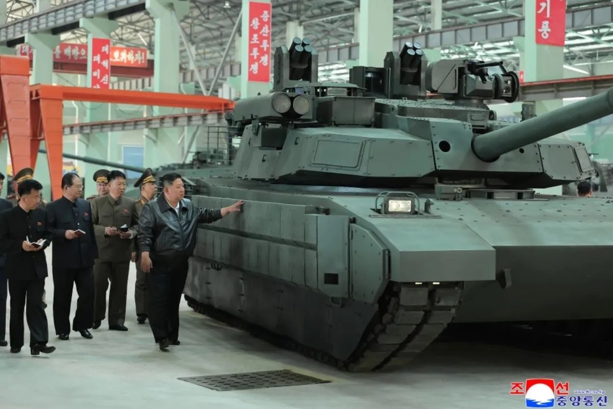 North Korea Photos Offer Glimpse of Kim Jong Un’s Tank Factory - Newsweek