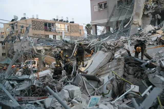 Videos, Pictures Show Aftermath of Iranian Strikes on Tel Aviv - Newsweek