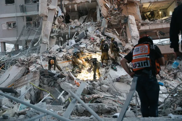 Videos, Pictures Show Aftermath of Iranian Strikes on Tel Aviv - Newsweek