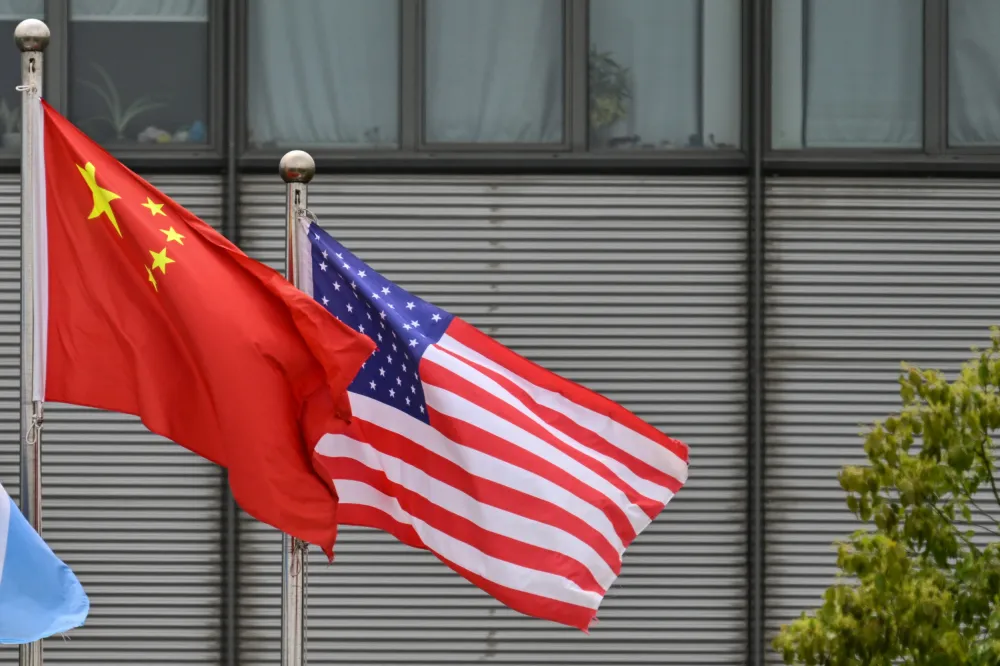US Government Worker Prevented From Leaving China: What We Know - Newsweek