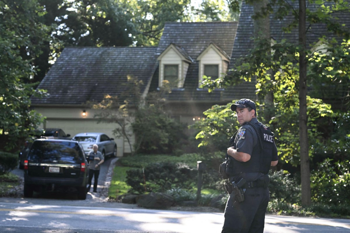 FBI Agents Exit John Bolton’s Office With Boxes in Raid - Newsweek