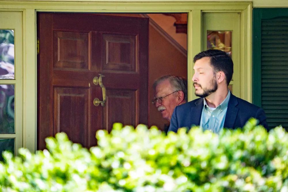 FBI Agents Exit John Bolton’s Office With Boxes in Raid - Newsweek