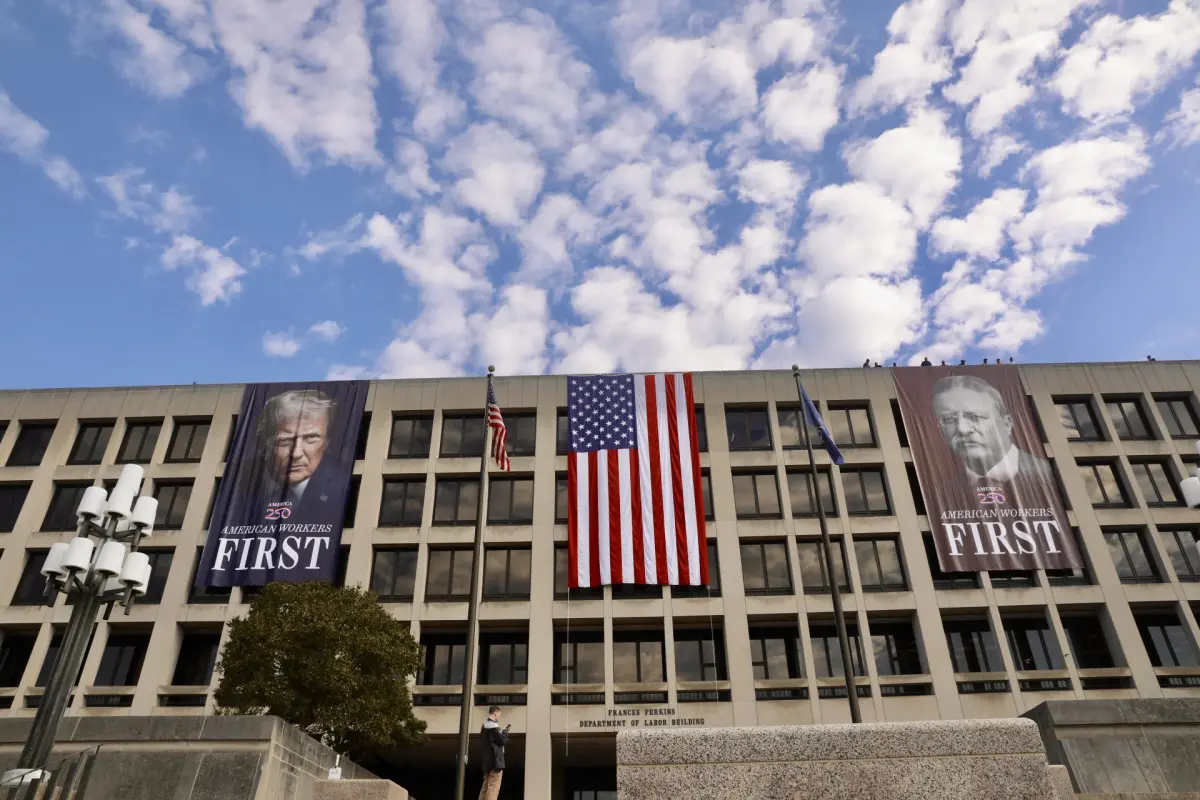 Giant Donald Trump Portrait Draped Over Department of Labor Building in ...