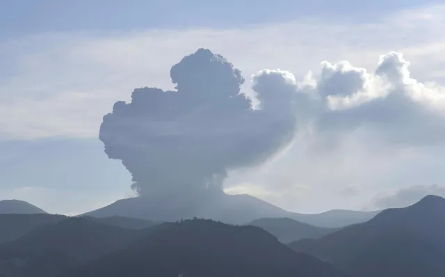 Japan Volcano Erupts, Firing Ash Plume 3 Miles Into Sky - Newsweek