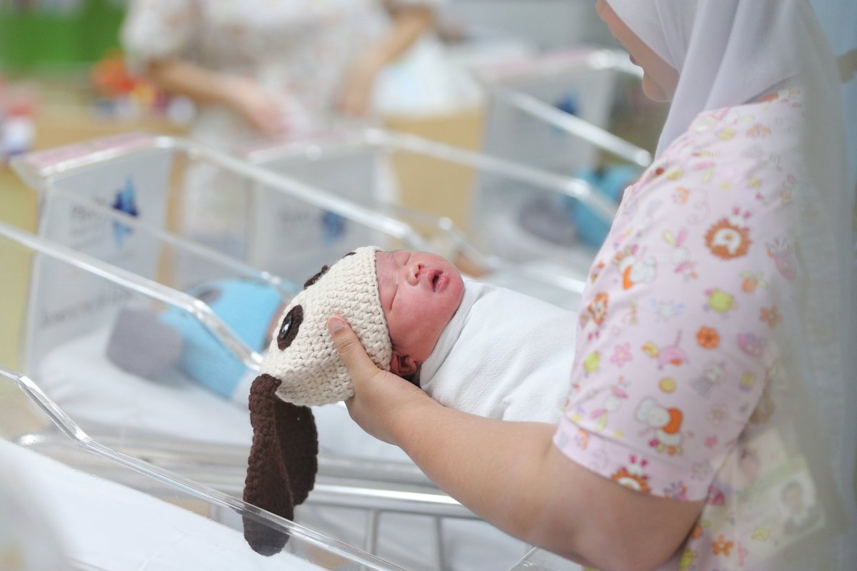 Gang Sells Babies on Social Media for $9,200 Each - Newsweek