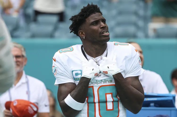 Dolphins Star Tyreek Hill Carted Off Field, Believed to be Dislocated ...