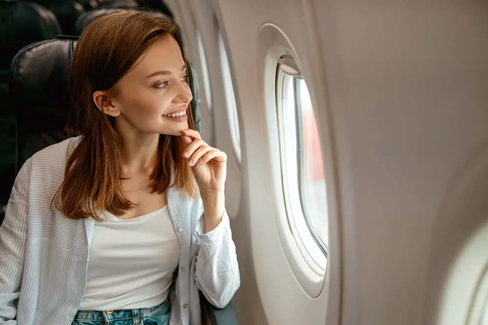 Woman boards plane, stunned her pilot boyfriend's announcement - Newsweek