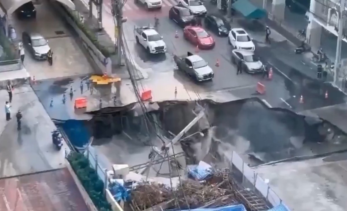 Watch: Massive Sinkhole Collapses Entire Road Outside Hospital - Newsweek