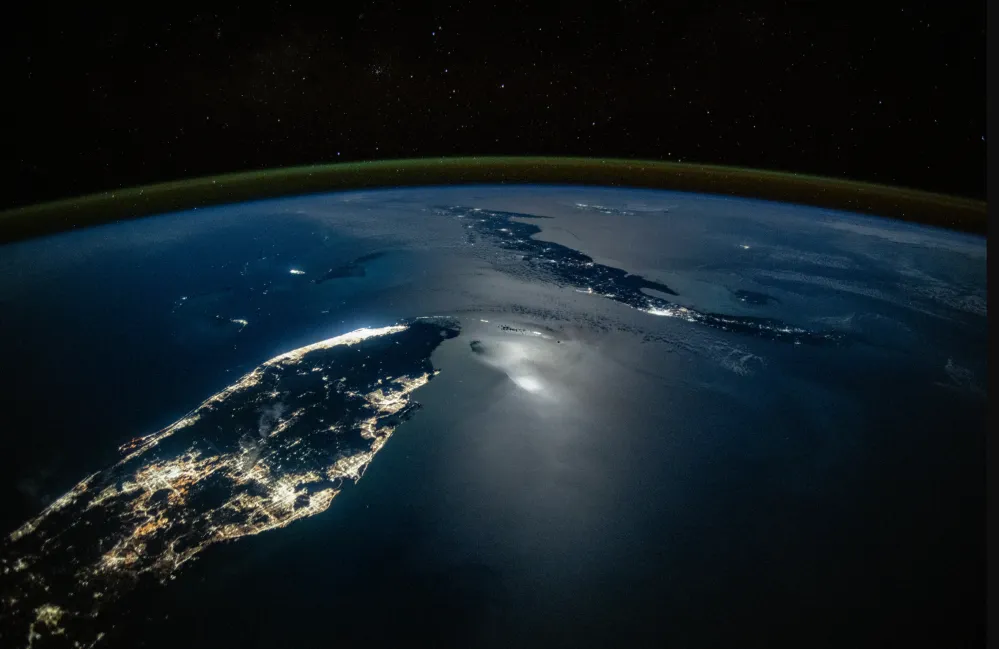 Stunning ISS Photo of Florida, Cuba Captures ‘Moonglint’ - Newsweek