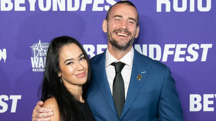 AJ Lee Made Painful Mistake During First Kiss With CM Punk - Newsweek