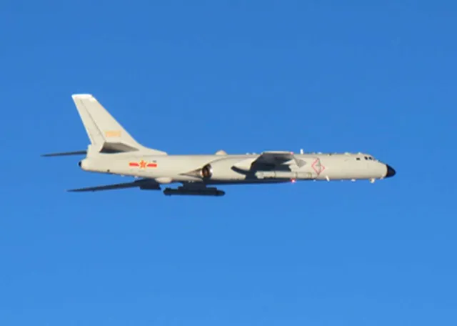 Photo Shows Armed Chinese Bomber Intercepted by US Ally - Newsweek