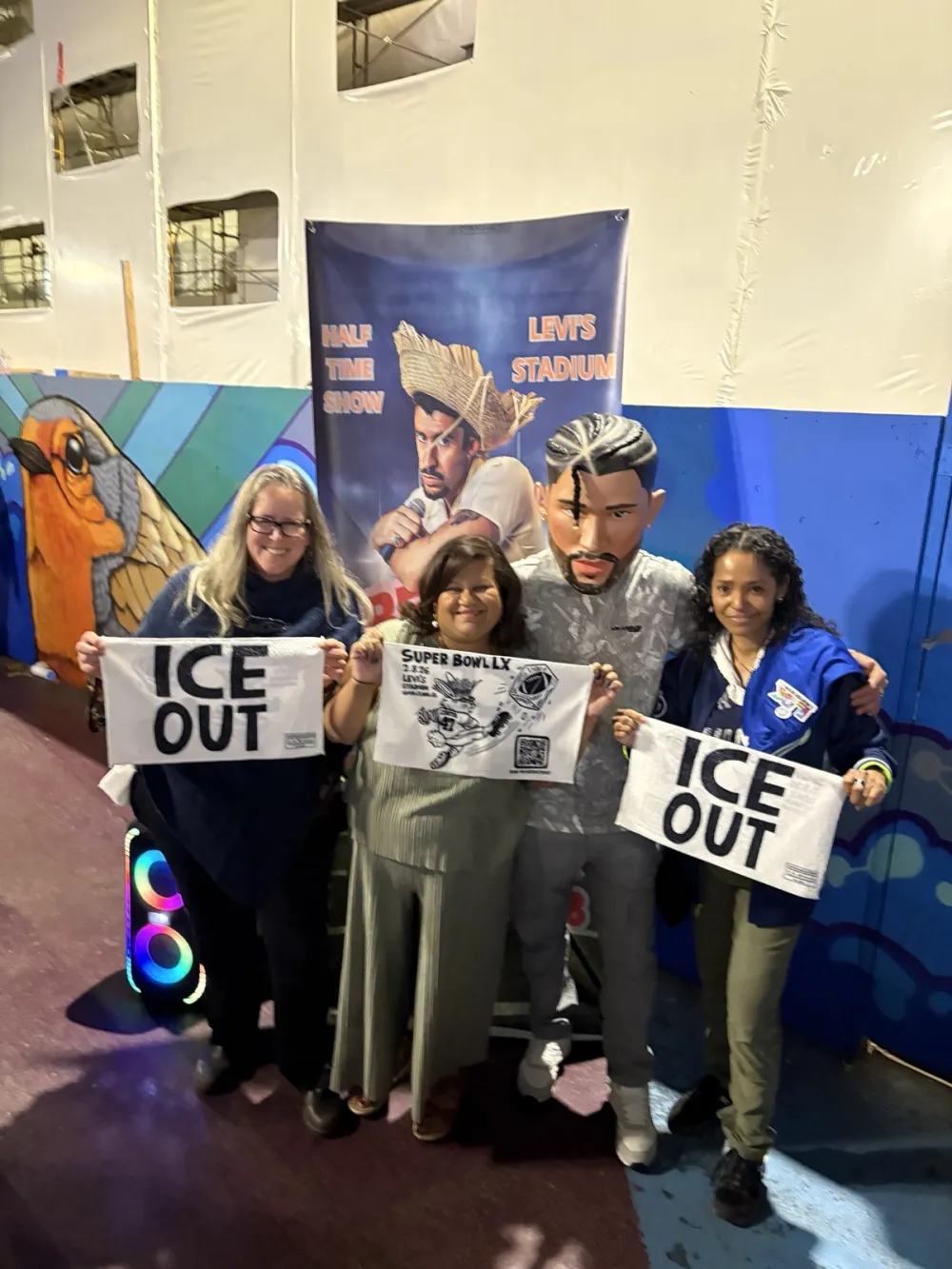 Activists Hand Out ‘ICE OUT’ Towels at Super Bowl LX - Newsweek