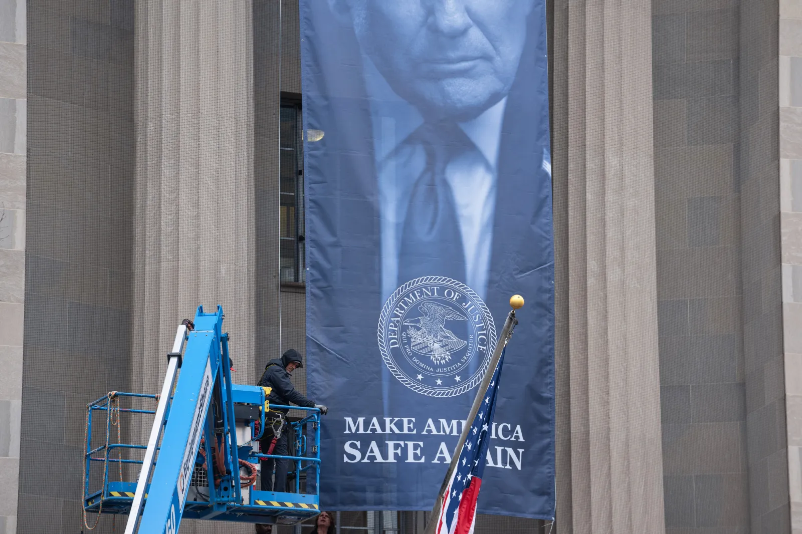 New pro-Trump banner appears at DOJ headquarters - Newsweek