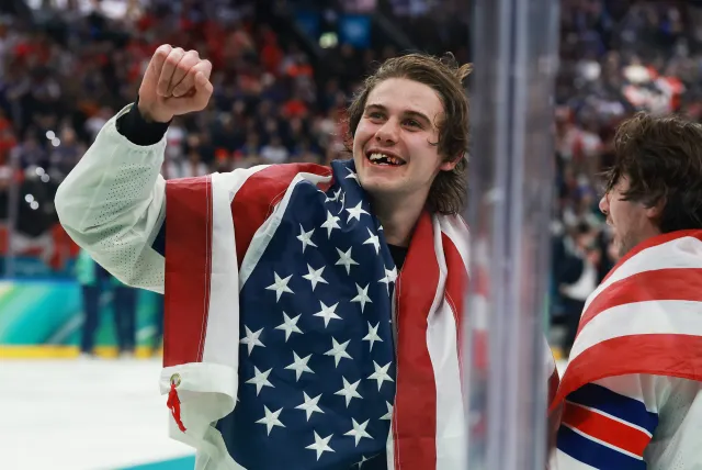 Photo of Toothless USA Star Jack Hughes Goes Viral After Gold Medal ...
